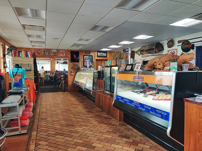 The brick-lined pathway leads you past fresh catches toward dining room delights that await your inevitable surrender.