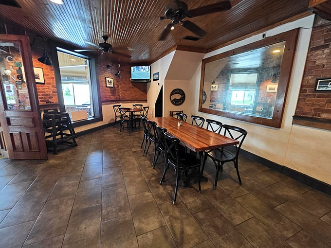 Exposed brick and wood beams create the perfect backdrop for conversations that last longer than dessert.