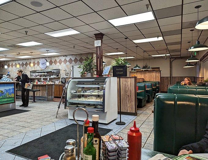 That dessert case whispers sweet promises while you pretend you're just here for eggs.