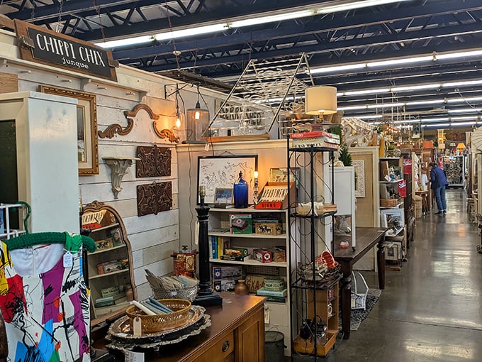 Aisles stretch forever like your grandmother's attic multiplied by infinity, each booth a different decade's greatest hits collection.