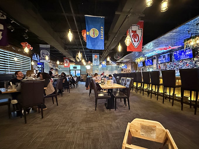 Inside, Kansas City Chiefs flags hang proudly alongside nautical decor, proving seafood and football make perfect teammates.