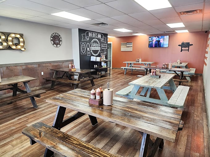 Rustic wooden tables and picnic-style seating create the perfect backdrop for serious barbecue business&mdash;no pretense, just pure comfort.