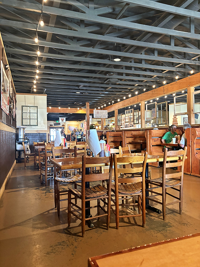 The exposed beams and string lights create an atmosphere where pretense goes to die, thankfully.