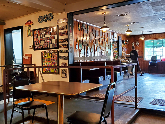 The wooden spoons hanging overhead watch over diners like culinary guardian angels in this cozy, art-filled sanctuary.