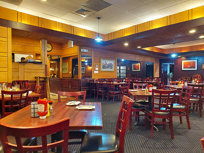 Warm wood paneling and comfortable seating create that perfect "neighborhood gem" atmosphere where memories are made between bites.