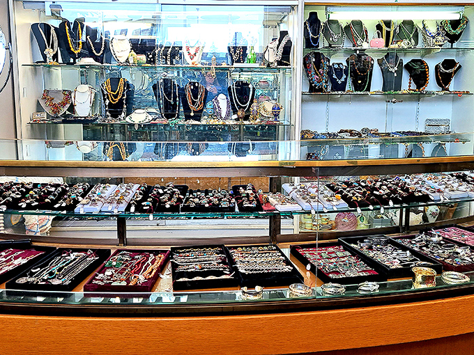 This jewelry display could bankrupt even the most disciplined shopper. Each gleaming piece whispers stories of elegant soirées and bygone fashion statements.