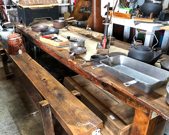 This rustic workbench showcases cast iron cookware that's outlived several generations of kitchen trends. Grandma would approve.
