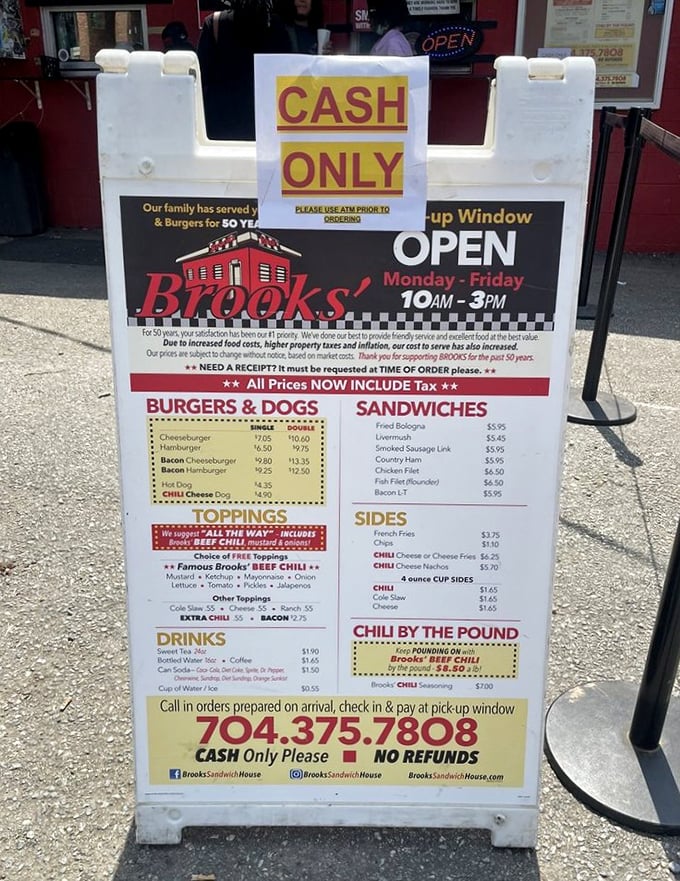 Cash only, folks! This no-nonsense menu board is like a treasure map where X marks the spot for Charlotte's most coveted chili-topped burgers.