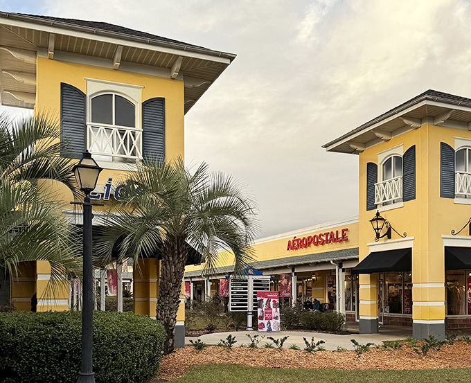 Sunshine yellow buildings with blue shutters create that perfect Gulf Coast vibe. A&eacute;ropostale beckons shoppers with promises of casual cool at outlet prices.