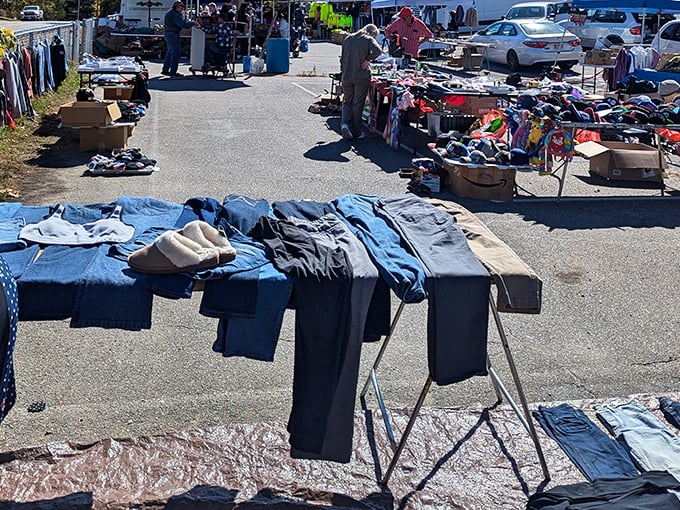 Denim democracy in action! Jeans of every era and style await new legs while shoppers hunt for that perfect pre-worn pair.