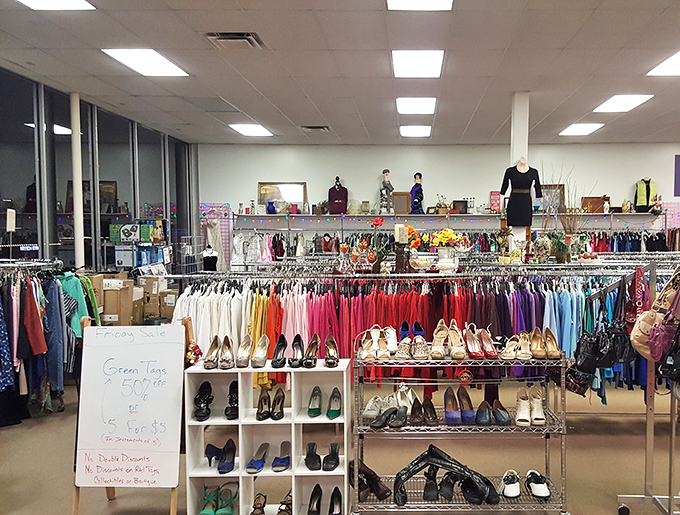 A rainbow of clothing possibilities stretches as far as the eye can see, with shoes organized by type&mdash;a thrifter's dream come true.