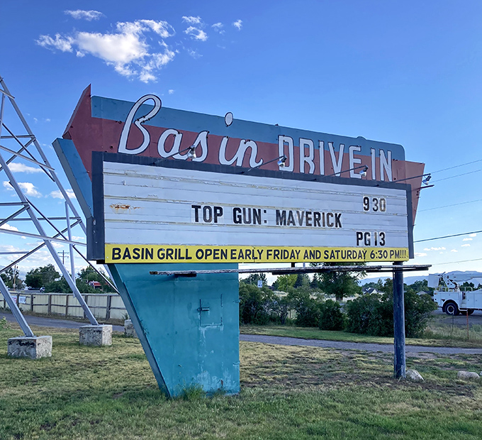 The iconic red arrow sign beckons like a time machine to simpler days. "Top Gun: Maverick" meets small-town Americana.