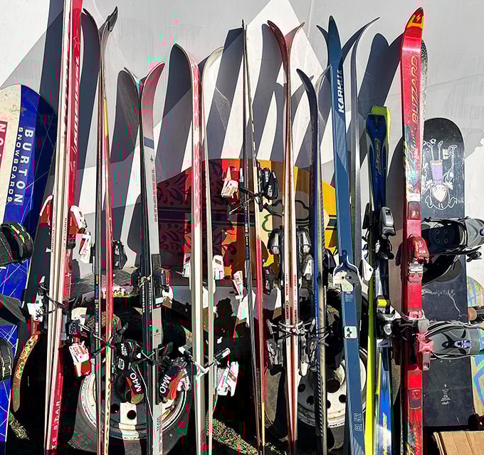 Vermont's winter sports legacy stands tall in this collection of vintage skis and snowboards—each with stories of powder days and chairlift conversations etched into their well-worn surfaces.
