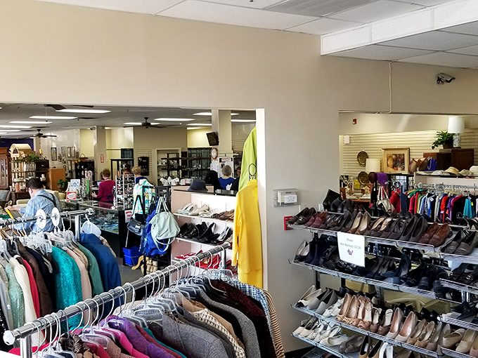A shopper's paradise where clothing racks and shoe displays compete for your attention. The retail equivalent of a well-organized buffet.