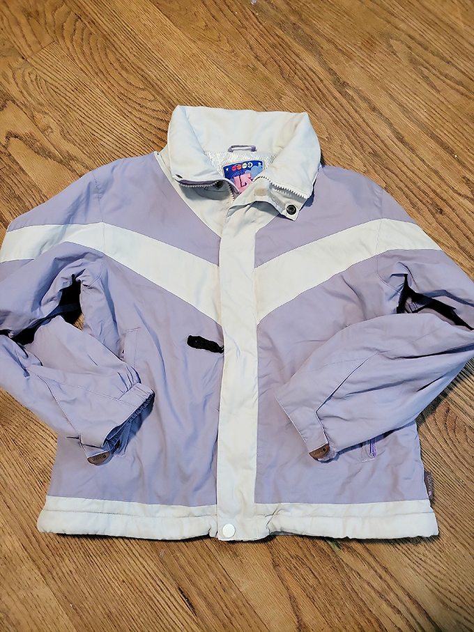 That lavender and white windbreaker is ready for its comeback tour, because '90s nostalgia never looked so affordable.