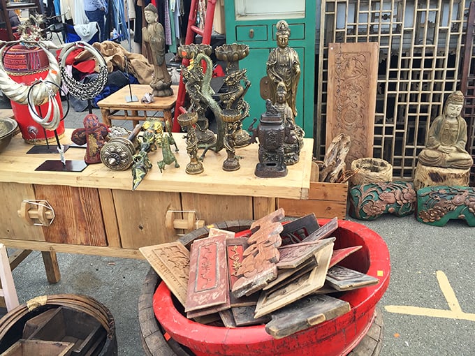 Ancient deities and carved figures stand at attention, silently waiting for new homes. Each piece tells a story from halfway around the world.