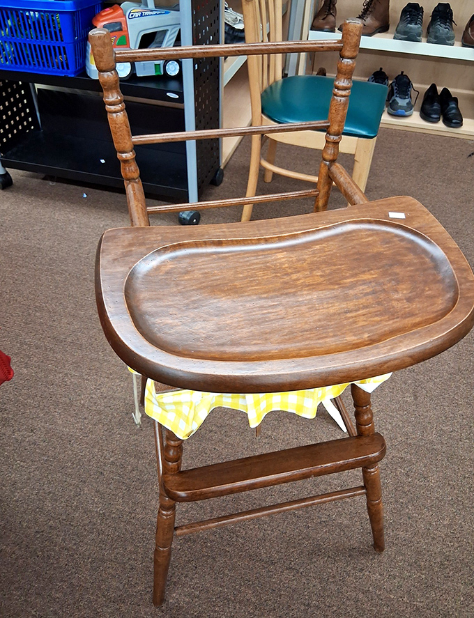 This wooden high chair has witnessed more family meals than a grandmother's dining room table, ready for its next generation.