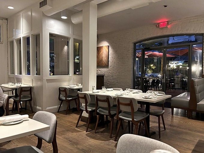 Modern, clean, and refreshingly free of plastic lobsters&mdash;this dining room means business about your dining pleasure.