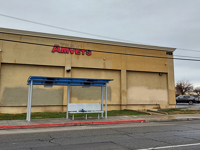 AMVETS Thrift Store stands ready for treasure hunters, its no-frills exterior hiding a warehouse of possibilities for bargain seekers.