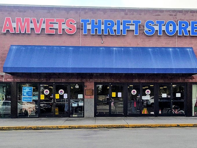 AMVETS Thrift Store's bold red and blue signage stands as a beacon for bargain hunters and veterans' supporters alike.