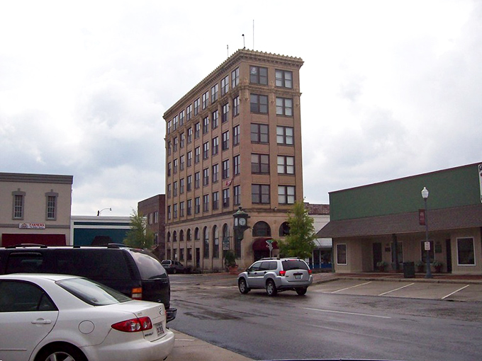 This stately building has witnessed generations of townsfolk gathering beneath its watchful gaze, never rushing their hellos.