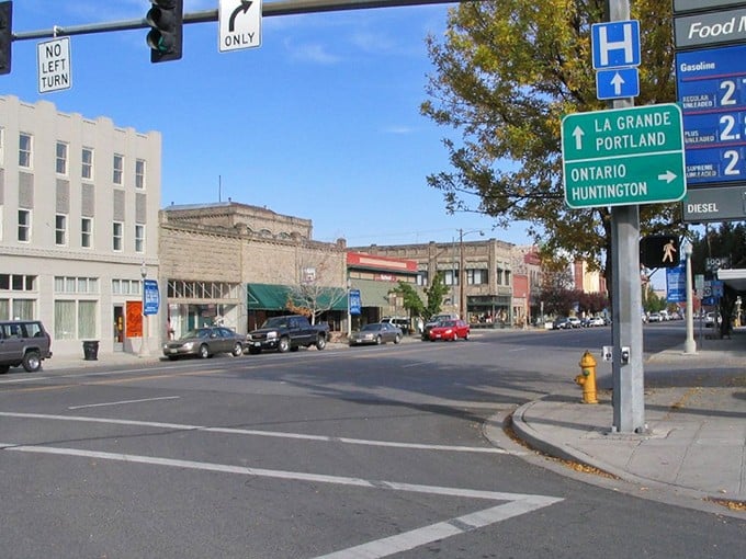 Baker City's main street stretches toward distant mountains, inviting leisurely strolls through authentic Old West charm.