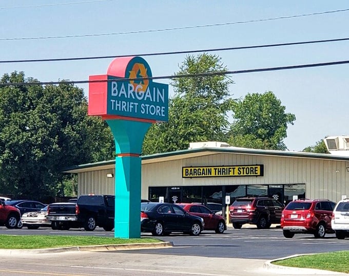 That teal and pink sign is like a retro Vegas marquee announcing the jackpot of bargains waiting inside this thrifter's paradise.