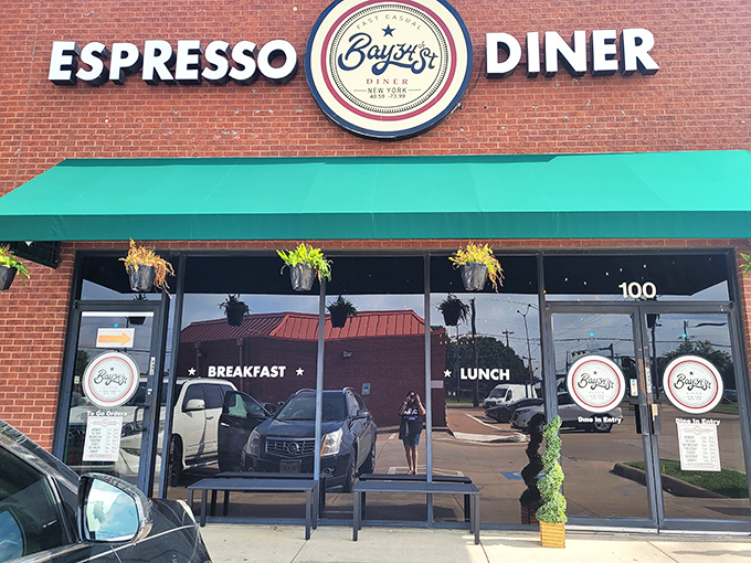 Bay34th Street Diner's brick facade and espresso sign hint at what's inside: classic diner fare with a modern coffee twist. Breakfast perfection awaits behind those doors.