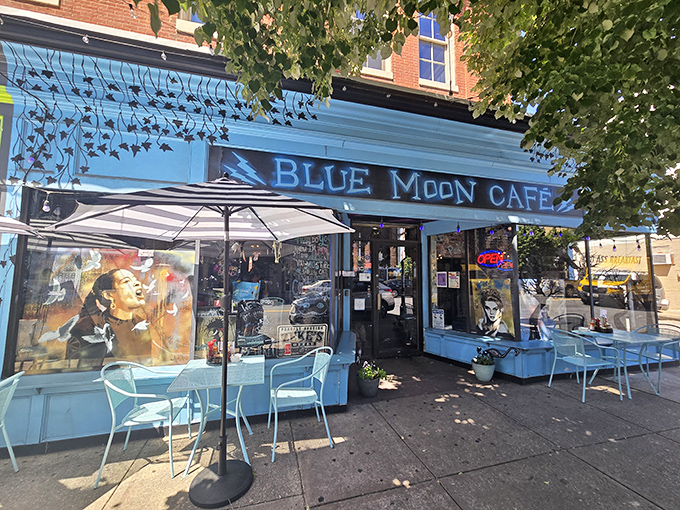 The Blue Moon Cafe's vibrant storefront is like Baltimore's breakfast equivalent of Willy Wonka's factory. The magic happens inside!