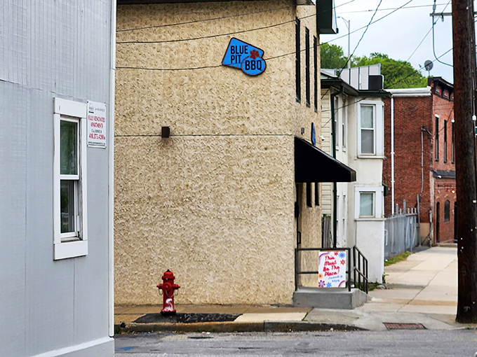 Blue Pit BBQ's unassuming exterior is the culinary equivalent of Clark Kent's glasses. Don't let that fire hydrant fool you&mdash;the real emergency is missing this food!
