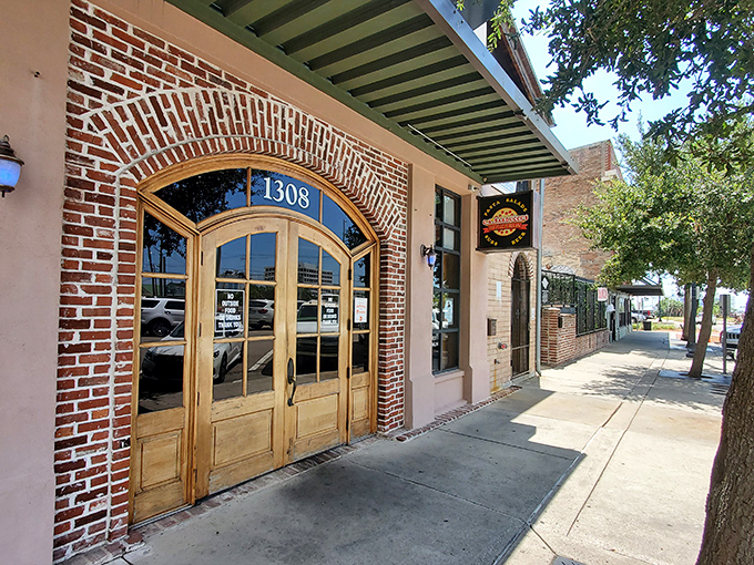 CA Sarducci's beautiful arched doorway feels like a portal to Italy. Spoiler alert: the pizza's worth the journey!