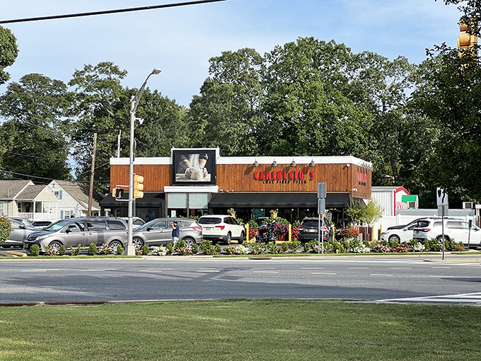 Don't judge this wooden wonder by its rustic cover - coal-fired perfection awaits within those walls.