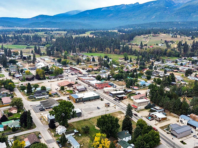 Darby's aerial view reveals a town nestled against mountains so majestic, they make your affordable mortgage feel like winning the lottery.