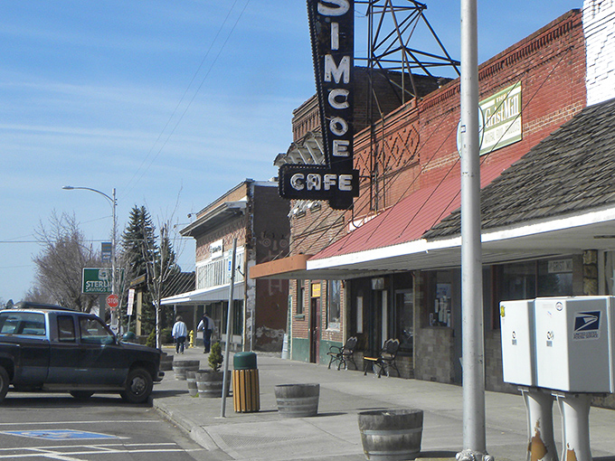 Simcoe Cafe's vintage sign promises coffee that costs less than your monthly streaming subscriptions.