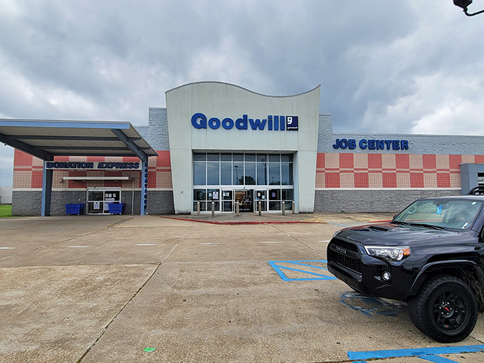 Modern curves meet thrift store charm at this Shreveport Goodwill, where even the architecture seems ready for a makeover.