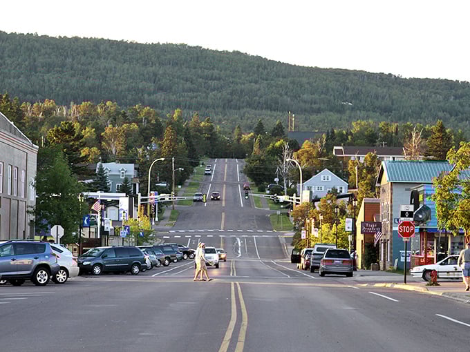 Grand Marais main street rolls toward forested hills like a scene from "Northern Exposure," where small-town charm meets wilderness adventure.