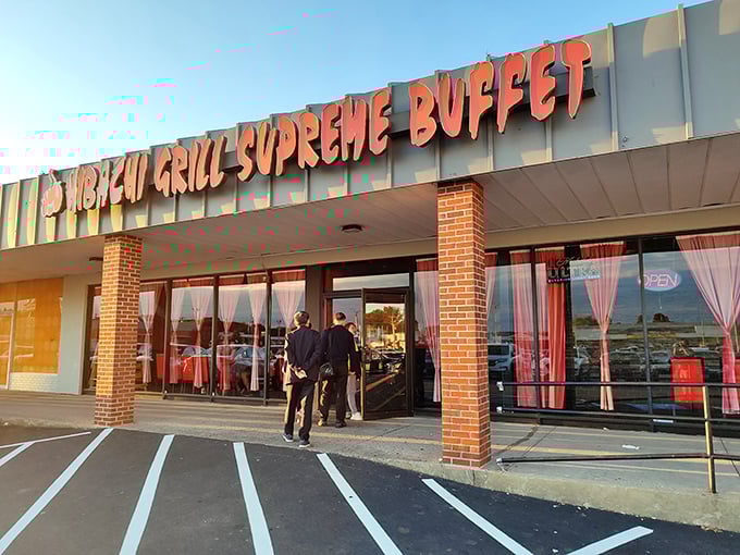 Hibachi Grill Supreme Buffet welcomes diners with fiery orange letters that match the sizzle waiting inside.