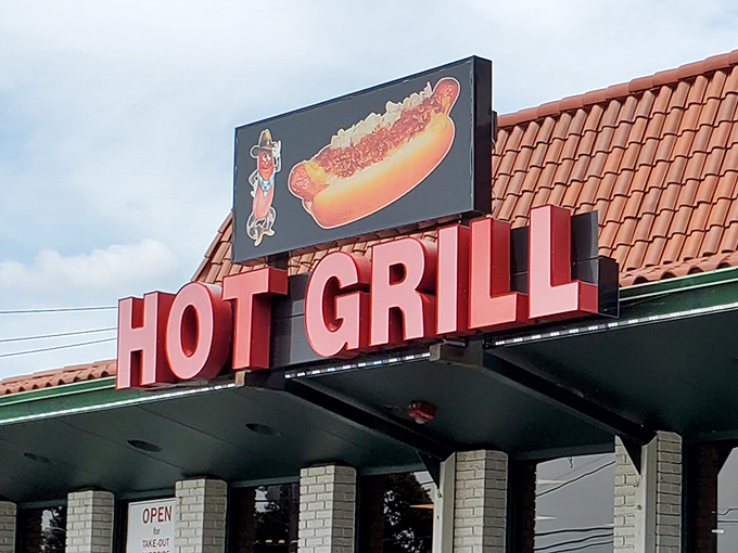 That sign isn't just bright&mdash;it's a beacon of hope for chili dog enthusiasts everywhere. The "Hot Grill" promises exactly what you need.