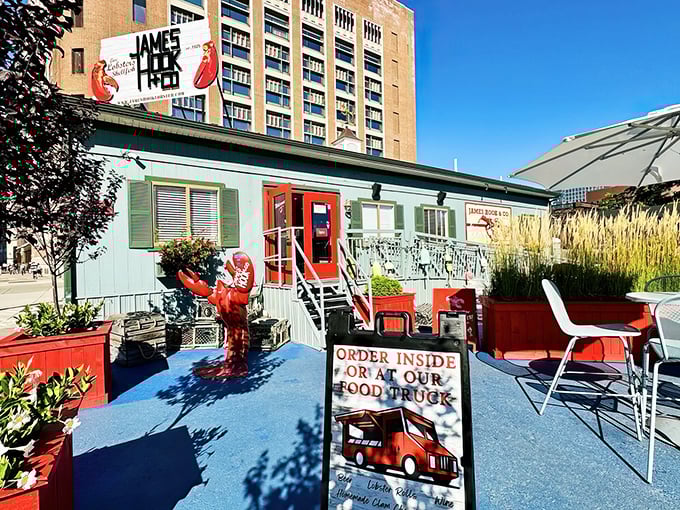 James Hook & Co's cheerful seafood shack stands proud amid Boston's skyscrapers. That red lobster sign promises treasures from the deep in the heart of the city.