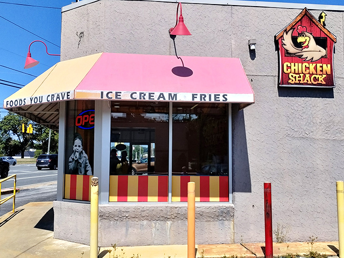 Pink awnings and vintage charm make this spot look like a scene straight from "Happy Days" come to life.