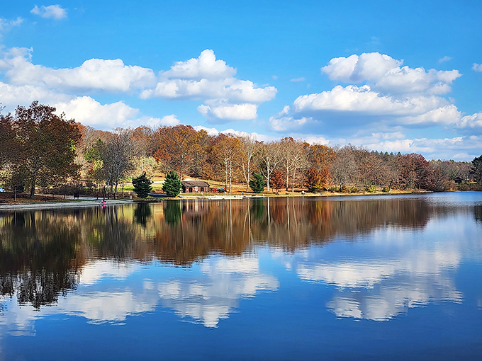 Mirror, mirror on the lake! Keystone's glassy waters create perfect reflections that double the autumn splendor.