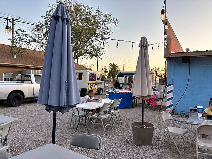 Sunset dining at its finest! Simple tables and string lights create the perfect backdrop for Lalo's legendary Sonoran dogs.