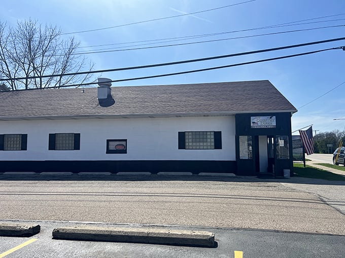 Laura's Country Diner exterior - This unassuming white building holds more culinary treasures than most fancy restaurants. Small-town magic in brick and mortar form.