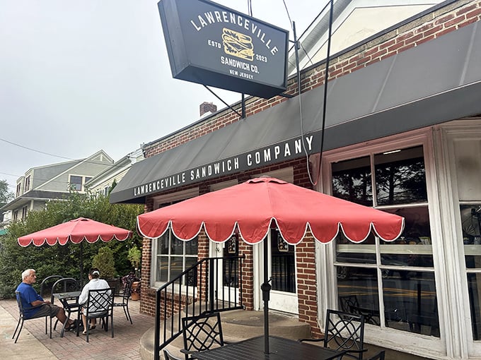Lawrenceville Sandwich Co.'s brick facade and cheerful awnings promise a taste of Main Street Americana with every bite.