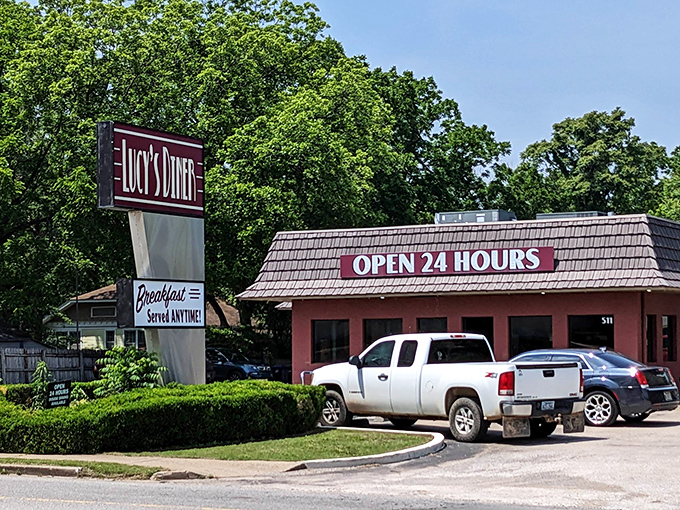 Lucy's Diner's pink exterior stands out like a neon promise &ndash; breakfast anytime is never just a slogan here.