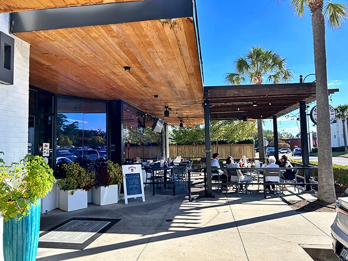 Palm trees and BBQ smoke make for an unexpectedly perfect combination in this Columbia culinary oasis.