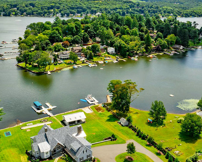 Morris wraps around its lake like a cozy sweater, with homes that seem to whisper "stay awhile" to every visitor.