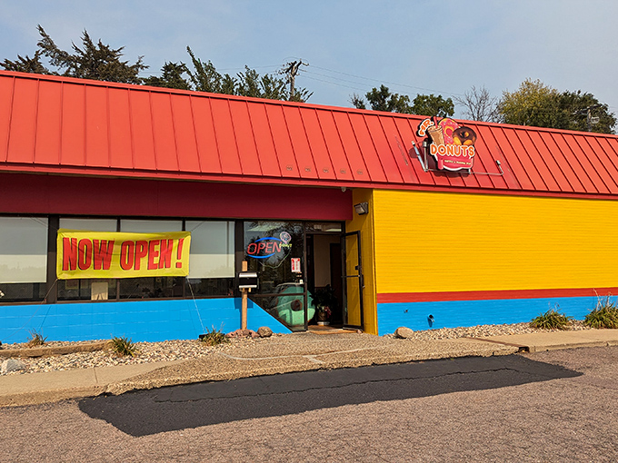 Mr. Donuts' vibrant exterior is like a colorful carnival for your taste buds. No clowns, just incredible pastries.