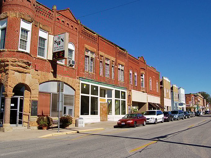 Nauvoo's main street showcases that distinctive Midwestern brick architecture where even the stone corner building looks like it's bragging a little.