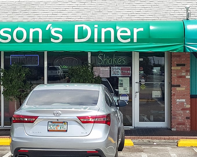 Nelson's Diner: That classic green awning signals you've found a no-nonsense spot where breakfast dreams come true without fancy pretensions.